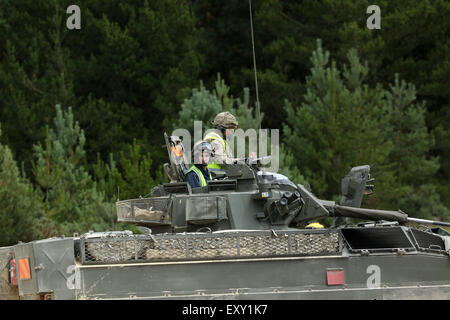 Crew of a British Army tank at Bovington Military training area, July ...