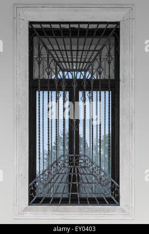 Medieval window with grate Stock Photo - Alamy