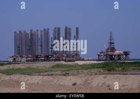 Soviet Oil rig platform on the shore of the Caspian Sea in the city of ...