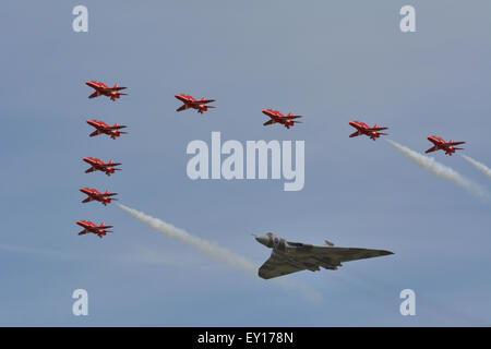 Avro Vulcan bomber and Red Arrows RAF BAe Hawk aircraft in formation at ...