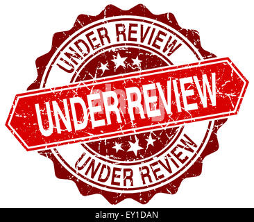 under review red grunge vintage stamp isolated on white background ...