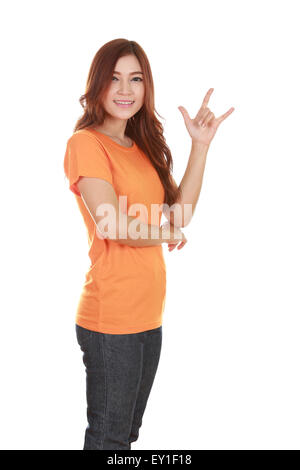 Teenager in orange t-shirt on a white background Stock Photo - Alamy