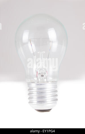 Clear light bulb with filament showing Stock Photo - Alamy