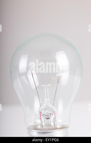 Clear light bulb with filament showing Stock Photo - Alamy