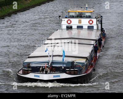 Douwina, a container ship and chemical tanker, navigates the Amsterdam ...