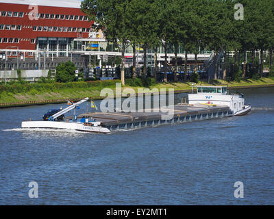 Ernest R, a container ship and oil tanker, navigates the Amsterdam-Rijn ...