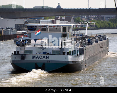 Macan, a container ship and chemical tanker, navigates the Amsterdam ...