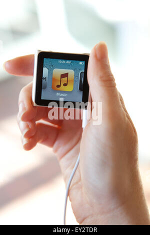 Playing Music on an iPod Nano Stock Photo - Alamy