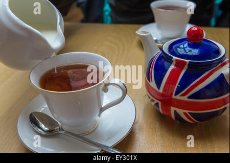 Cup of tea with Union Jack cup, saucer and newspaper, England, UK Stock ...