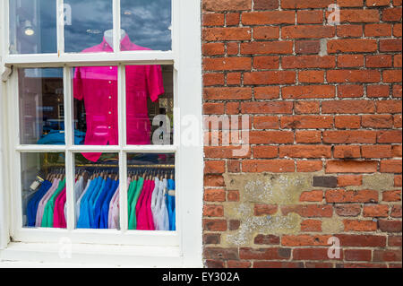 Colourful mens shirts in a shop window Stock Photo - Alamy