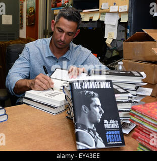 Jorge Posada greets fans and signs copies of his book 'The Journey Home ...