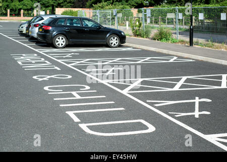 Parent & Child car Parking Bay Logo sign, Tesco, England UK Stock Photo ...