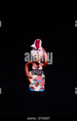 Clay Handmade Statue of a Cuban Woman on Black Background Stock Photo ...