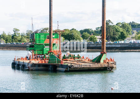 A floating barge for construction works at a harbour Stock Photo - Alamy