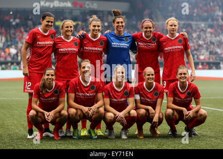 Portland, Oregon, USA. 22nd July, 2015. TOBIN HEATH (17) calms a girl ...