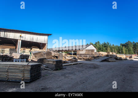 Saw mill with stack of wood Stock Photo - Alamy