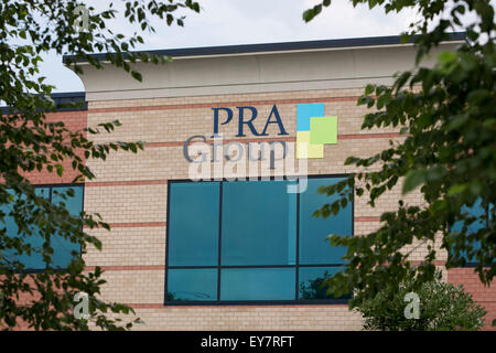 A logo sign outside of the headquarters of the PRA Group, Inc., also ...