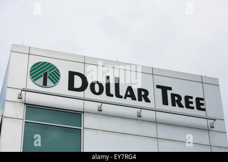 A logo sign outside of the headquarters and a store location of Whole ...