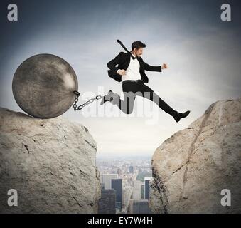 Businessman overcomes obstacles Stock Photo - Alamy