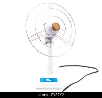 Small white plastic desktop fan side view, isolated on white background ...