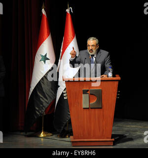 Syrian Information Minister Omran al-Zoubi speaks to the press before a ...