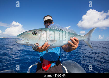 Fisherman with fresh caught Jobfish; Tahiti Stock Photo - Alamy