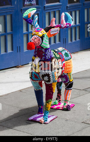 Decorated wire-framed woollen deer, 'Yarn Bombed' anaimal covered with ...