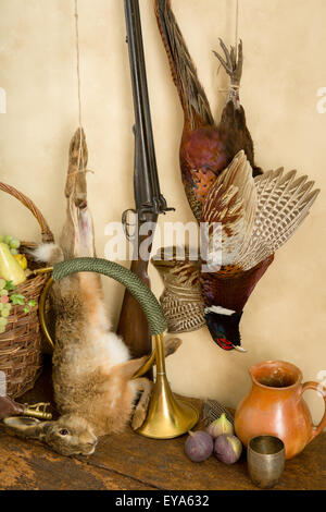 Autumn still life with hunting rifle, pheasant and hare Stock Photo - Alamy