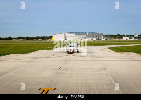 FILE - An American Airlines American Eagle jet flies past the air ...