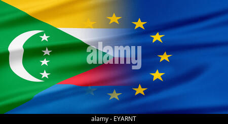 Comoros and European Union flag waving in the wind against white cloudy ...