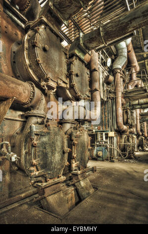 Decaying boiler room in an abandoned power plant Stock Photo - Alamy