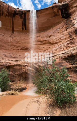 A flash flood in the desert after a heavy rain in Arches National Park ...
