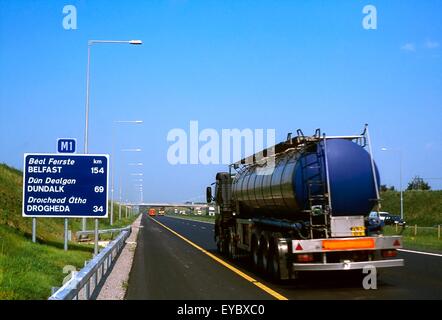 M1 Motorway, Co Dublin, Ireland; Car Driving By A Sign Stock Photo - Alamy