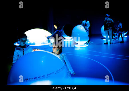 People at the CERN Visitor Centre in Geneva, Switzerland. CERN is the ...