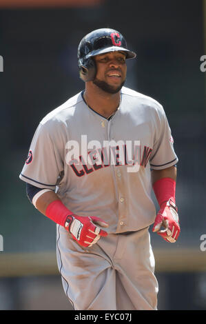 Cleveland Indians first baseman Carlos Santana, right, celebrates with ...