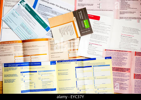 Various types of British social security benefit claim forms and ...