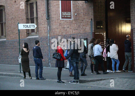 A queue for the toilets in The Rocks area of Sydney, Australia Stock ...