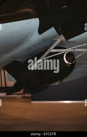 Bomb hanging below a Junkers JU-88 Stuka dive bomber. German bomber of ...