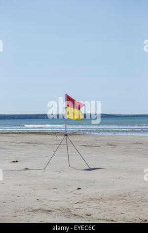 RNLI Safety Flag red and yellow Porthkidney Beach Lelant Cornwall Stock ...