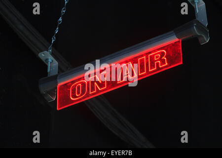 Television studio red 'on air' sign lit up Stock Photo - Alamy