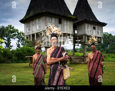 Timorese men in traditional attire at Liurai Village; Timor-Leste Stock ...