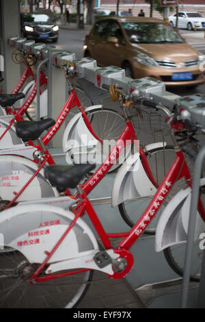 Bicycle hire in Beijing, China. March 2008 Stock Photo - Alamy
