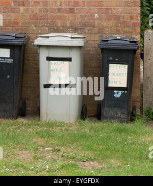 Waste bins and signs Stock Photo - Alamy