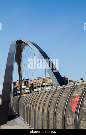 new modern footbridge with supporting arches and steel bulkheads Stock ...