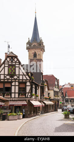 OBERNAI, FRANCE - MAY 11, 2015: Chapel tower, Sainte Odile fountain and ...