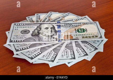 dollar banknotes on table in office with credit score illustration ...