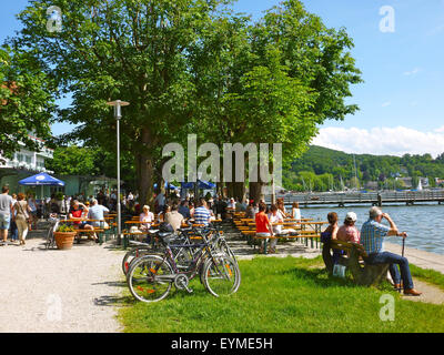 Germany, Upper Bavaria, 5-Seenland area, lake Starnberger See, Percha with Starnberg, sunbathing ...