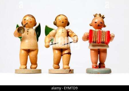 Broken wooden angels playing musical instruments, from the Erzgebirge ...