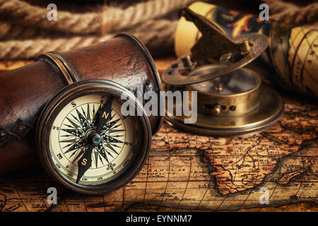 Old vintage compass on ancient map Stock Photo - Alamy