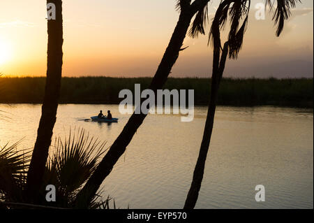 Boating at sunset on Doho Hot Springs, Awash National Park, Ethiopia ...